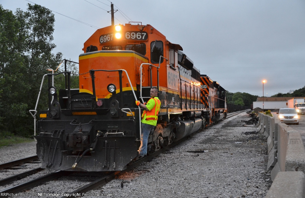 WE 6967 & 6354 have brought the loads into town.